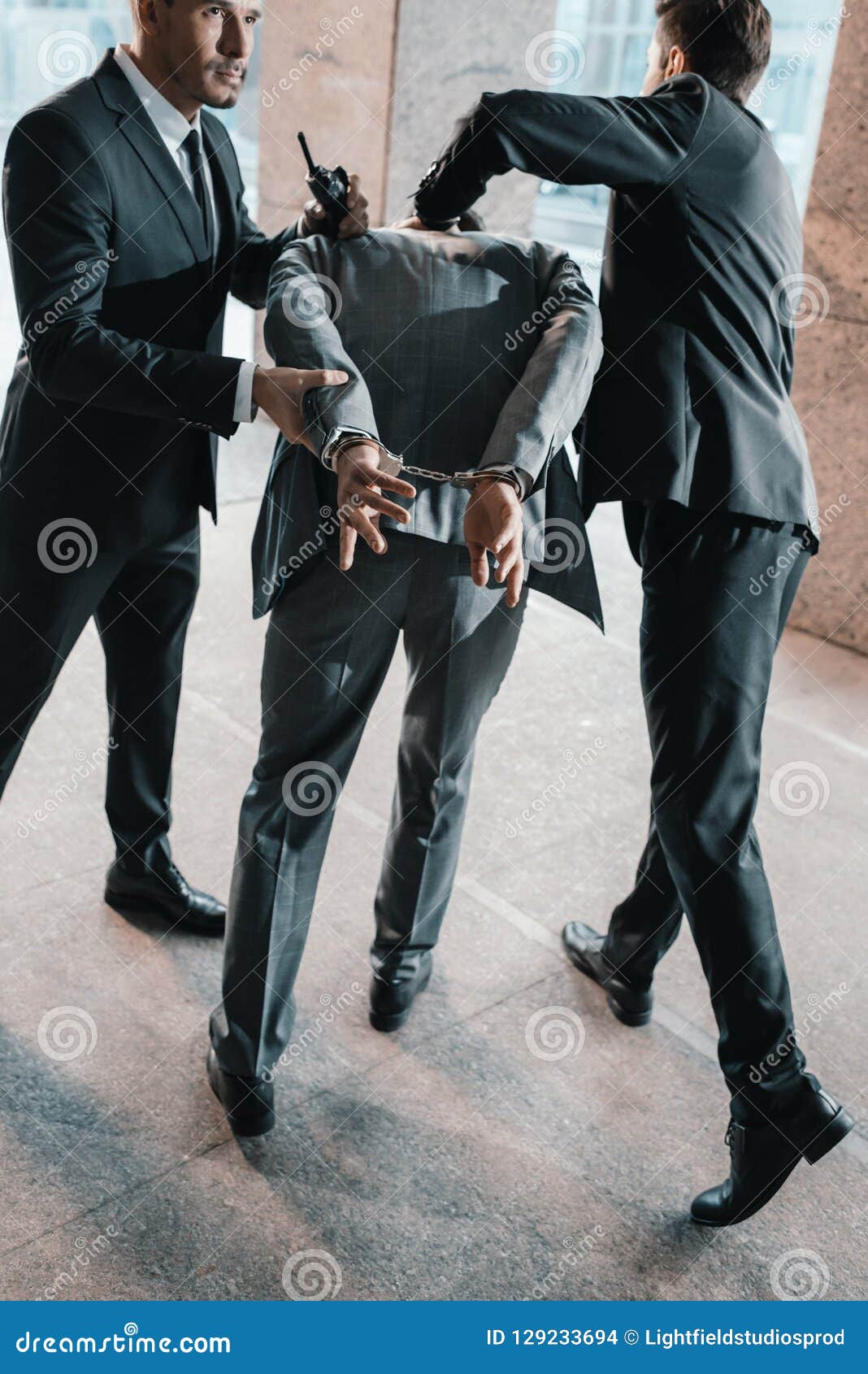 Cropped Image of Security Guards Stock Photo - Image of securityguards ...