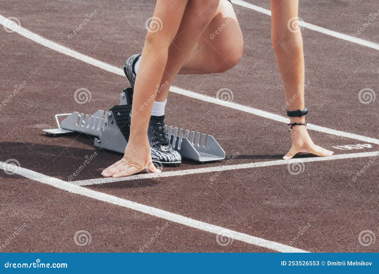 Cropped Image of a Sprinter Getting Ready To Start at Stadium Stock ... Cropped Image of a Sprinter Getting Ready To Start at Stadium Stock ...