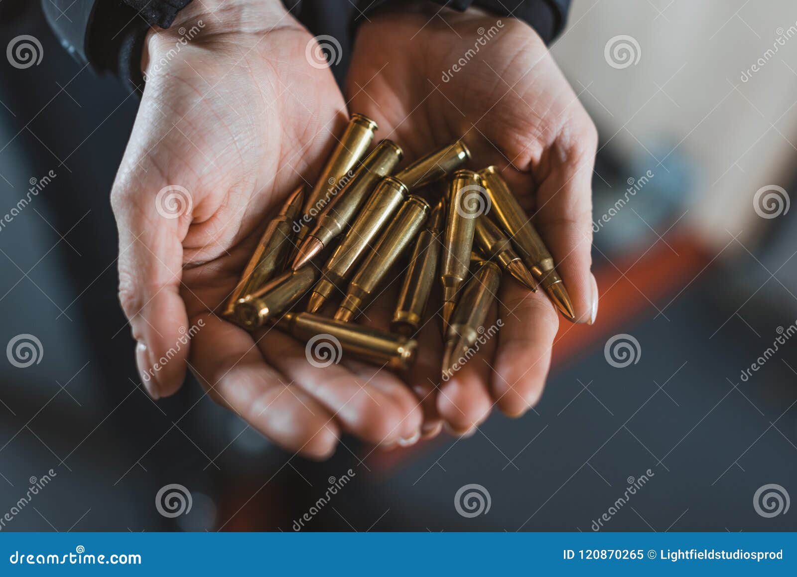 Cropped Image of Woman Holding Bullets Stock Image - Image of focus ...