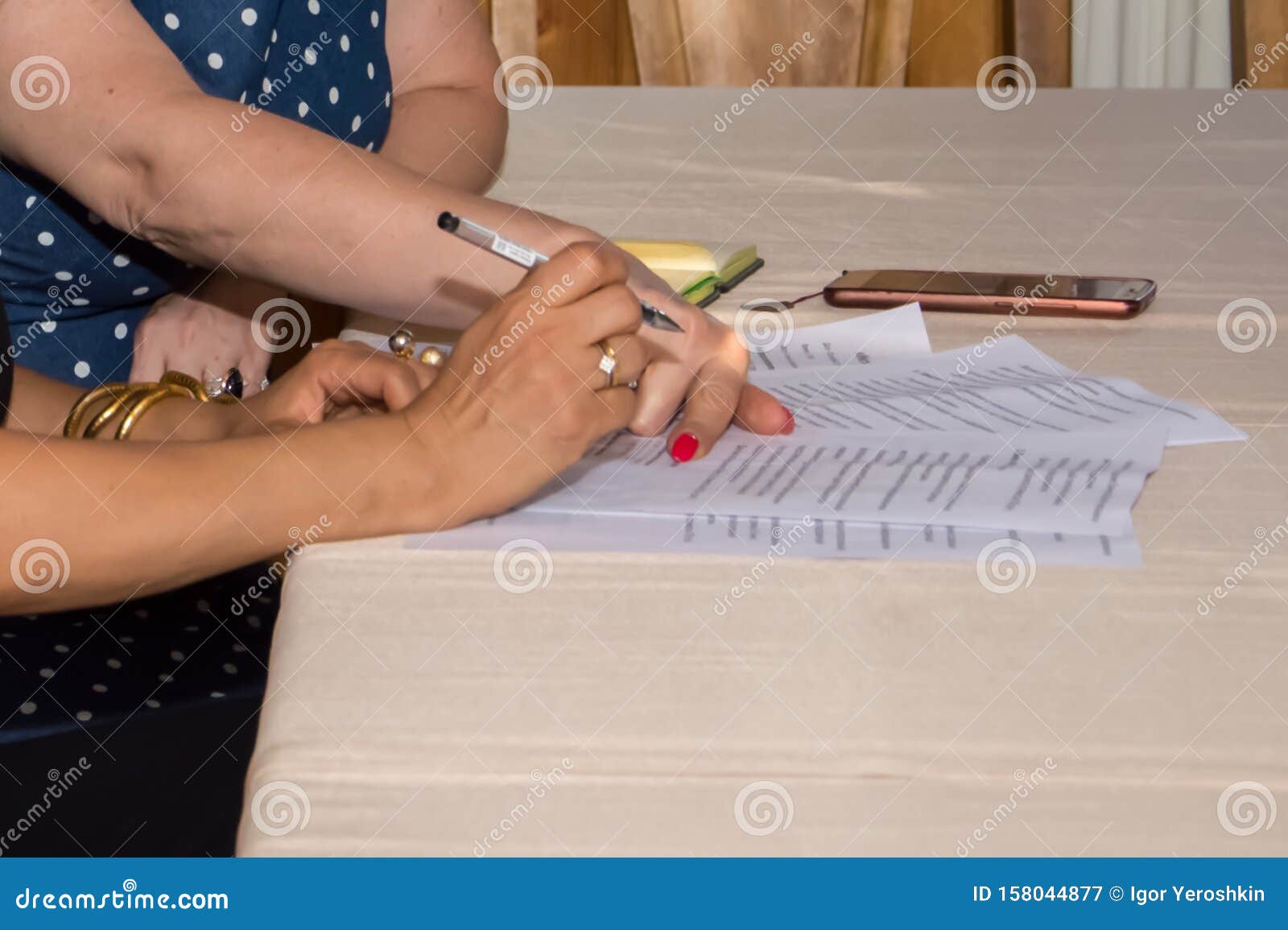 Cropped Image of Women Signing a Contract Stock Image - Image of ...