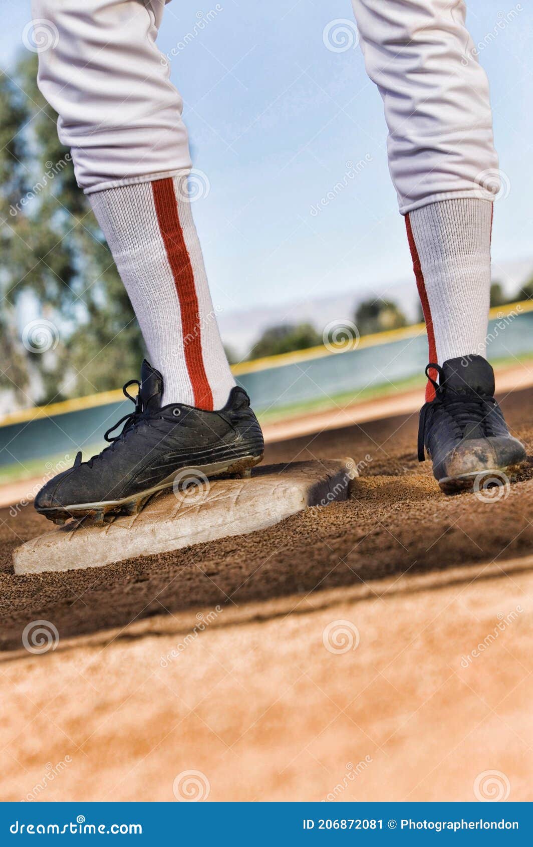 Cropped Photo of Baseball Player Standing on Base Stock Image - Image ...