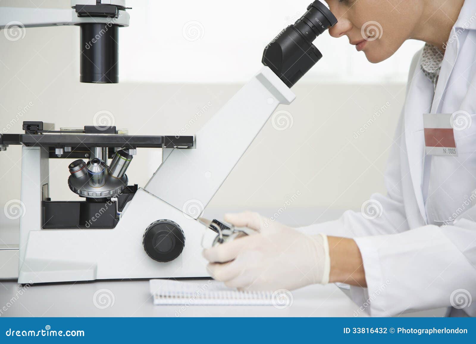 Cropped Scientist Using Microscope in Laboratory Stock Photo - Image of ...