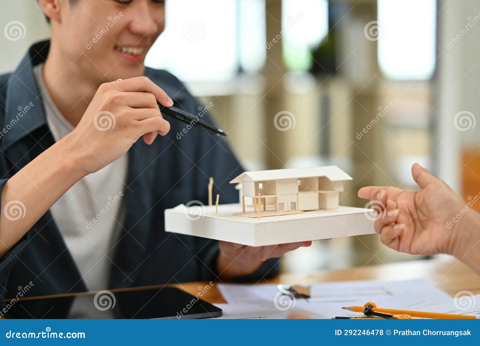 Cropped Shot of Architect Man with House Model Explaining Housing ...