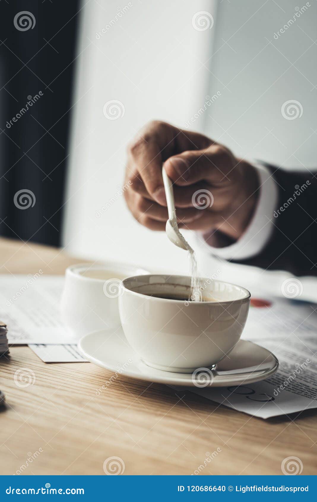 Cropped Shot of Businessman Adding Sugar Stock Photo - Image of ...