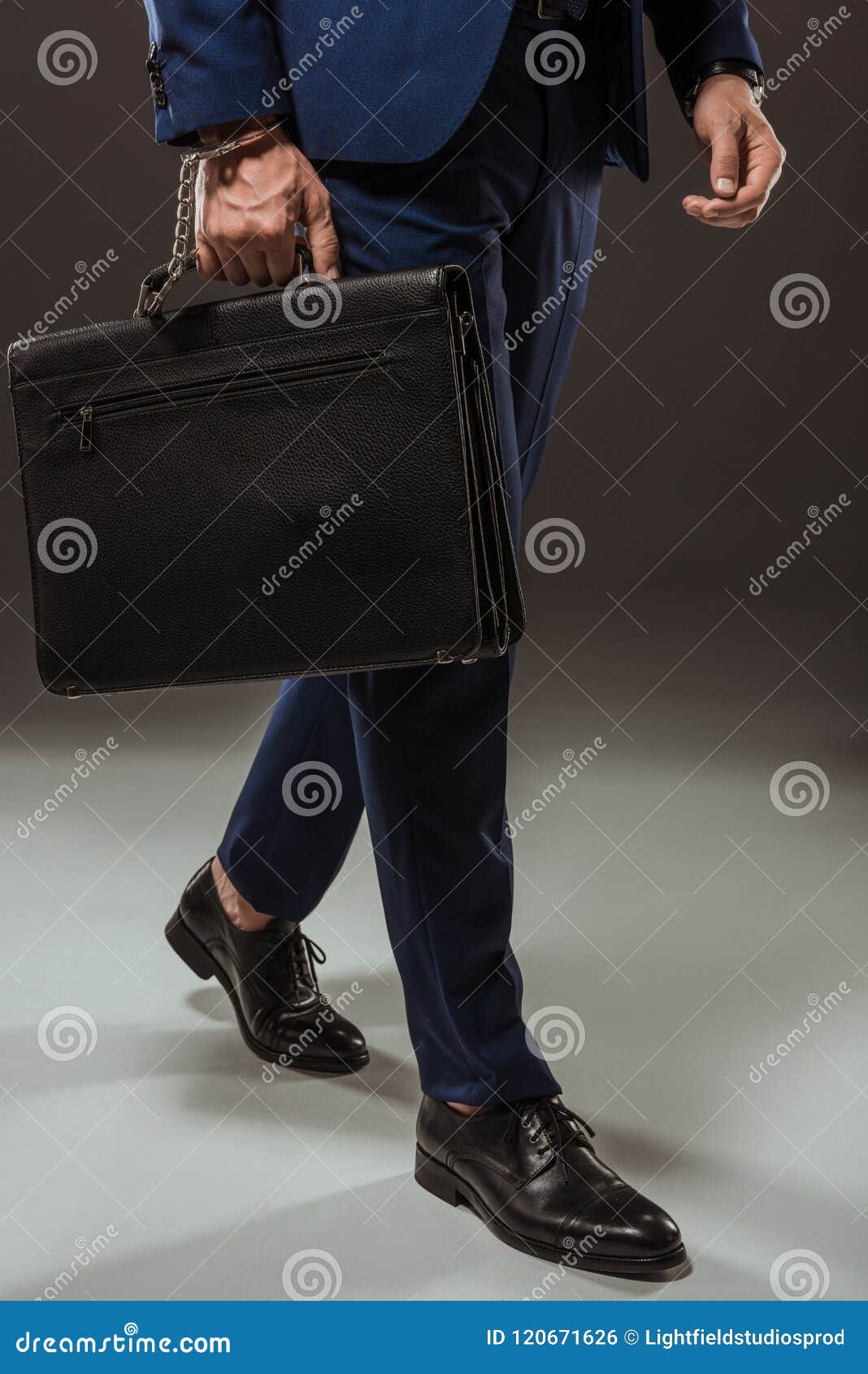 Cropped Shot of Businessman in Handcuffs with Briefcase Stock Photo ... Cropped Shot of Businessman in Handcuffs with Briefcase Stock Photo ...