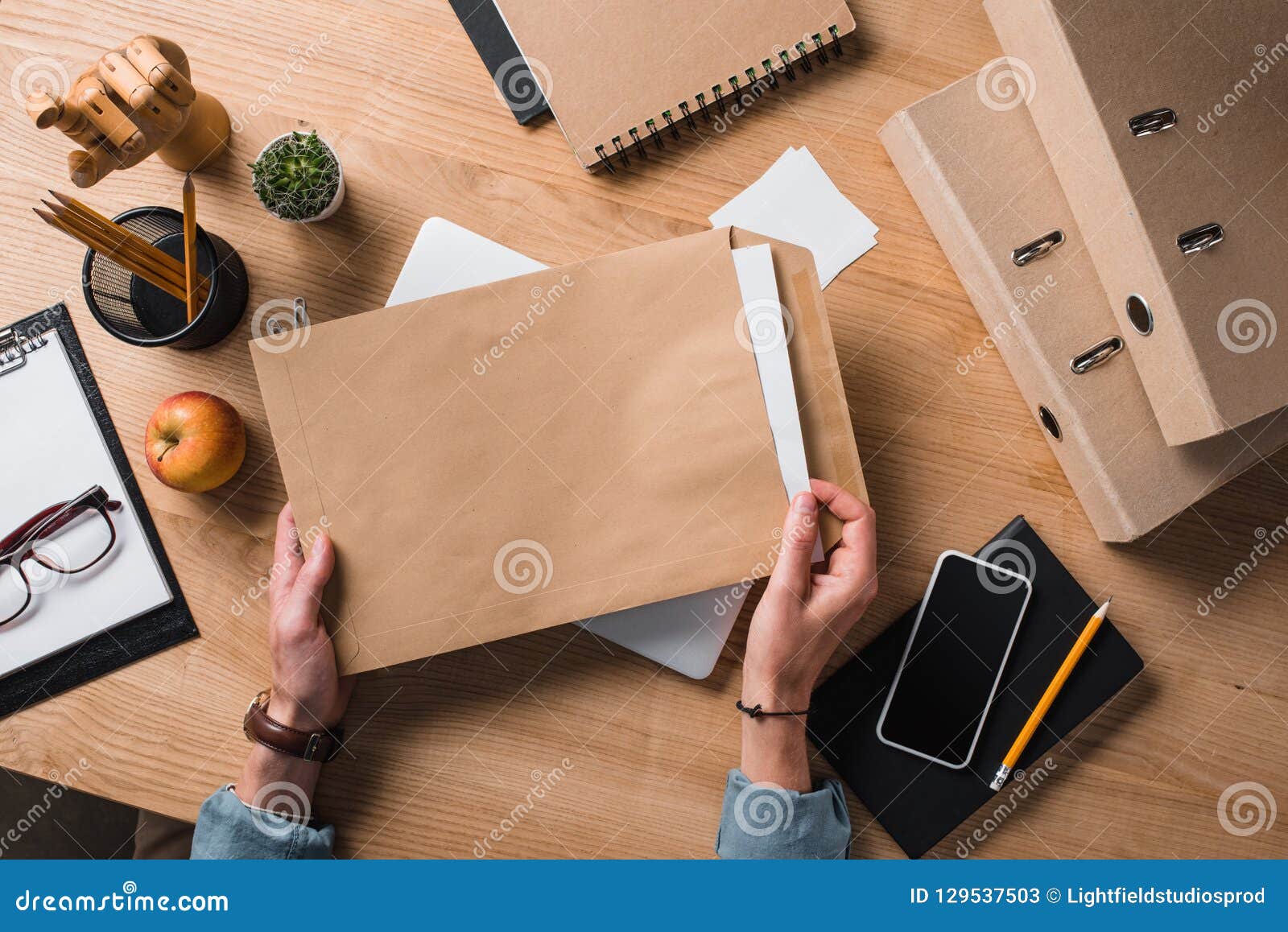 Cropped Shot of Businessman Holding Envelope with Documents Stock Image ...
