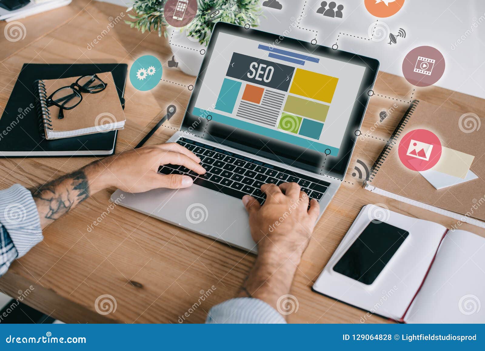 Cropped Shot of Developer Using Laptop with SEO Icons Stock Photo ...