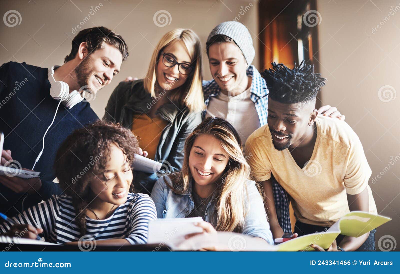 Looking at the New Assignment Together. Cropped Shot of a Group of ...