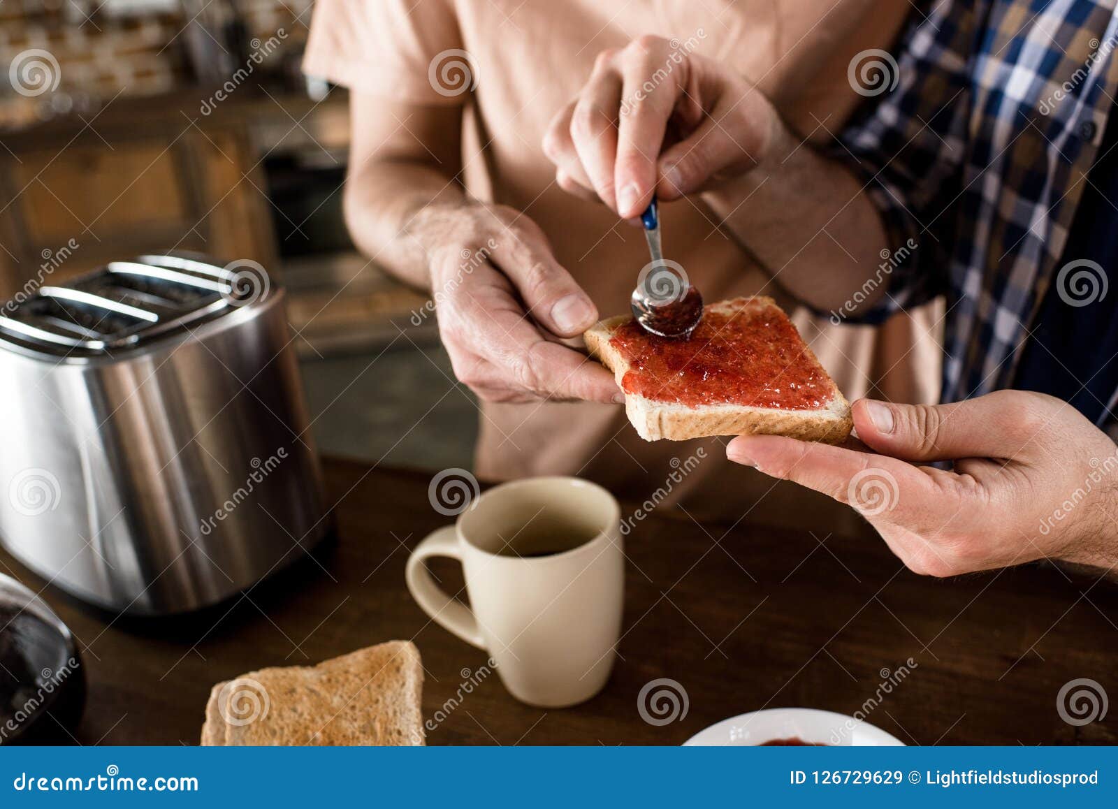 Cropped Shot of Men Preparing Toast with Jam for Breakfast Stock Image ...