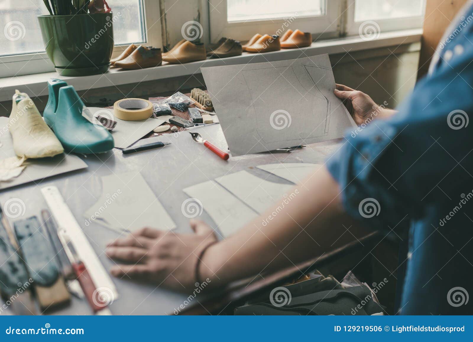 Cropped Shot of Shoemaker Drawing Outline for Shoes Stock Photo - Image ...