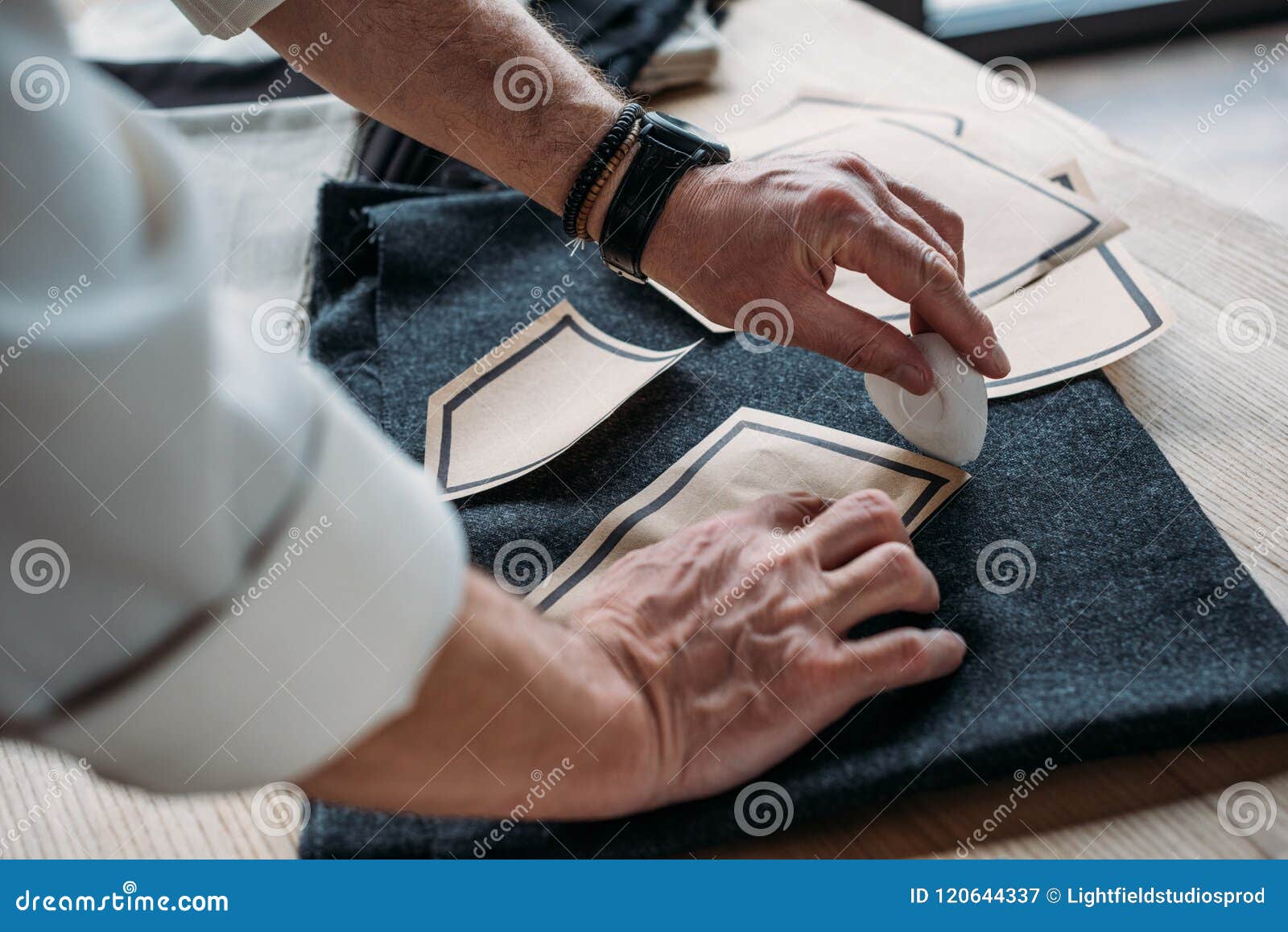 Cropped Shot of Tailor Marking Cloth Pattern with Chalk Stock Image ...