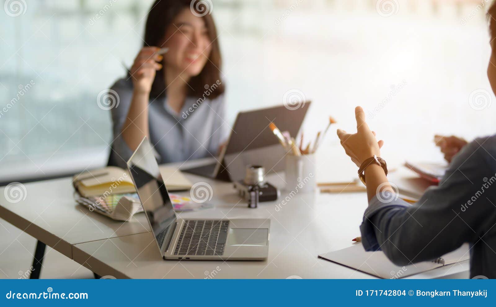 Cropped Shot of Team Application Developer Discussing on Their Project ...