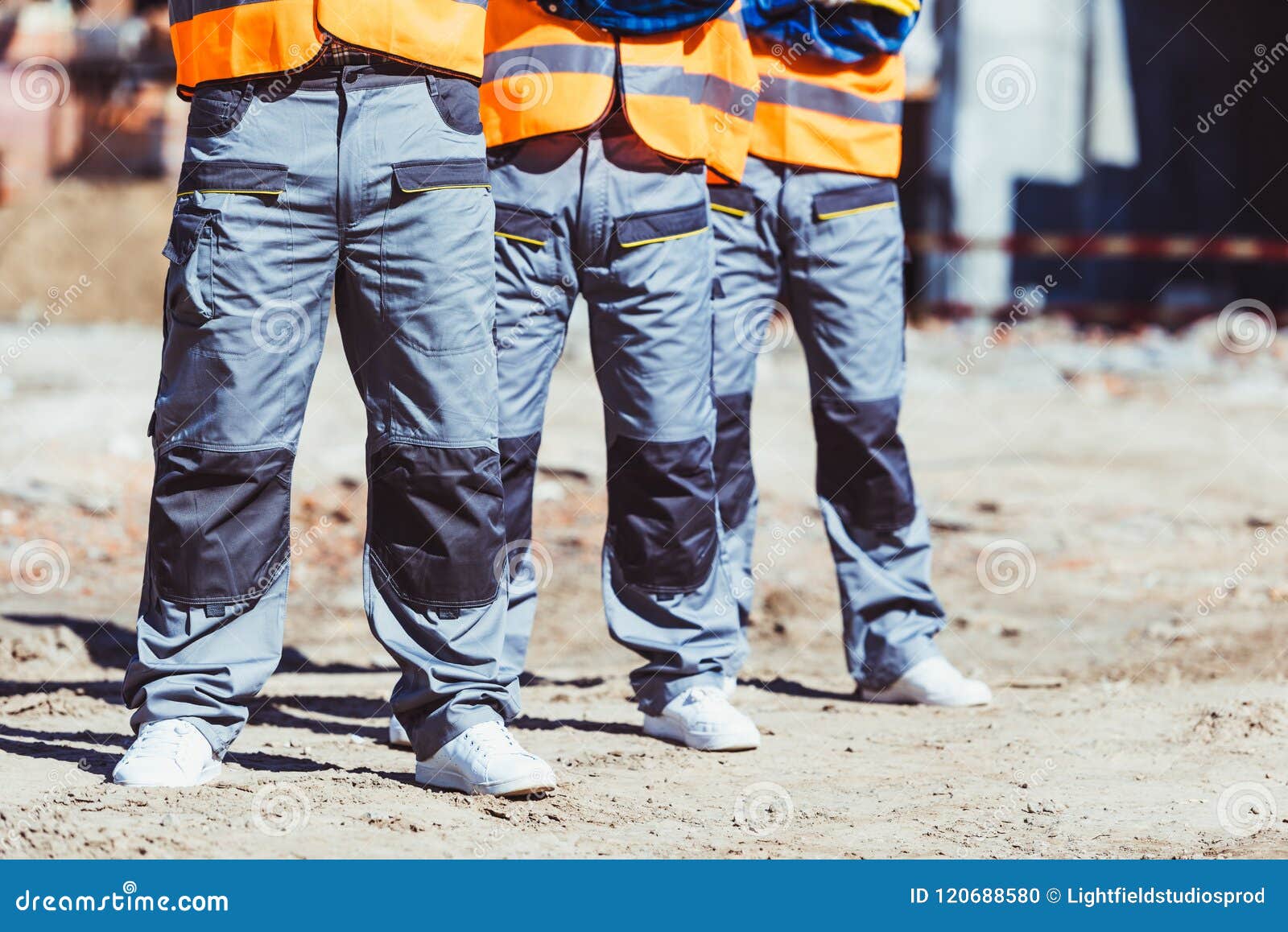 Cropped Shot of Three Labour Workers Standing at the Stock Photo ...