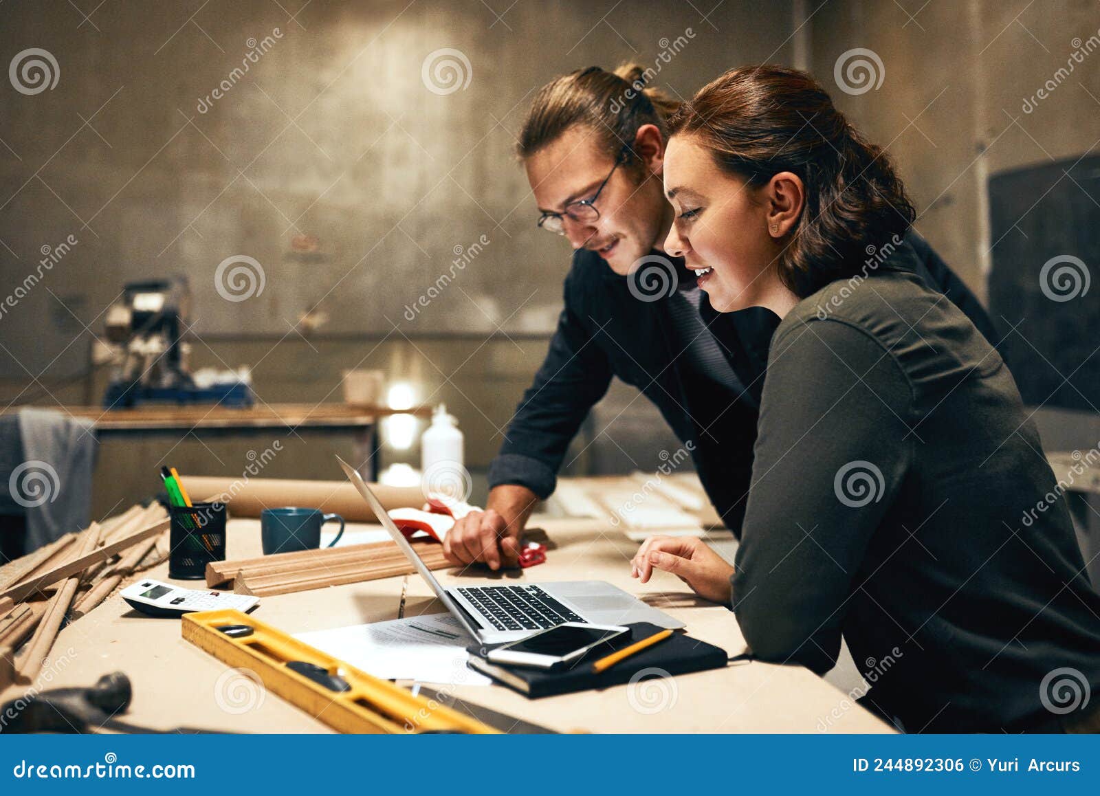 Putting Their Heads Together. Cropped Shot of Two Cheerful Young ...