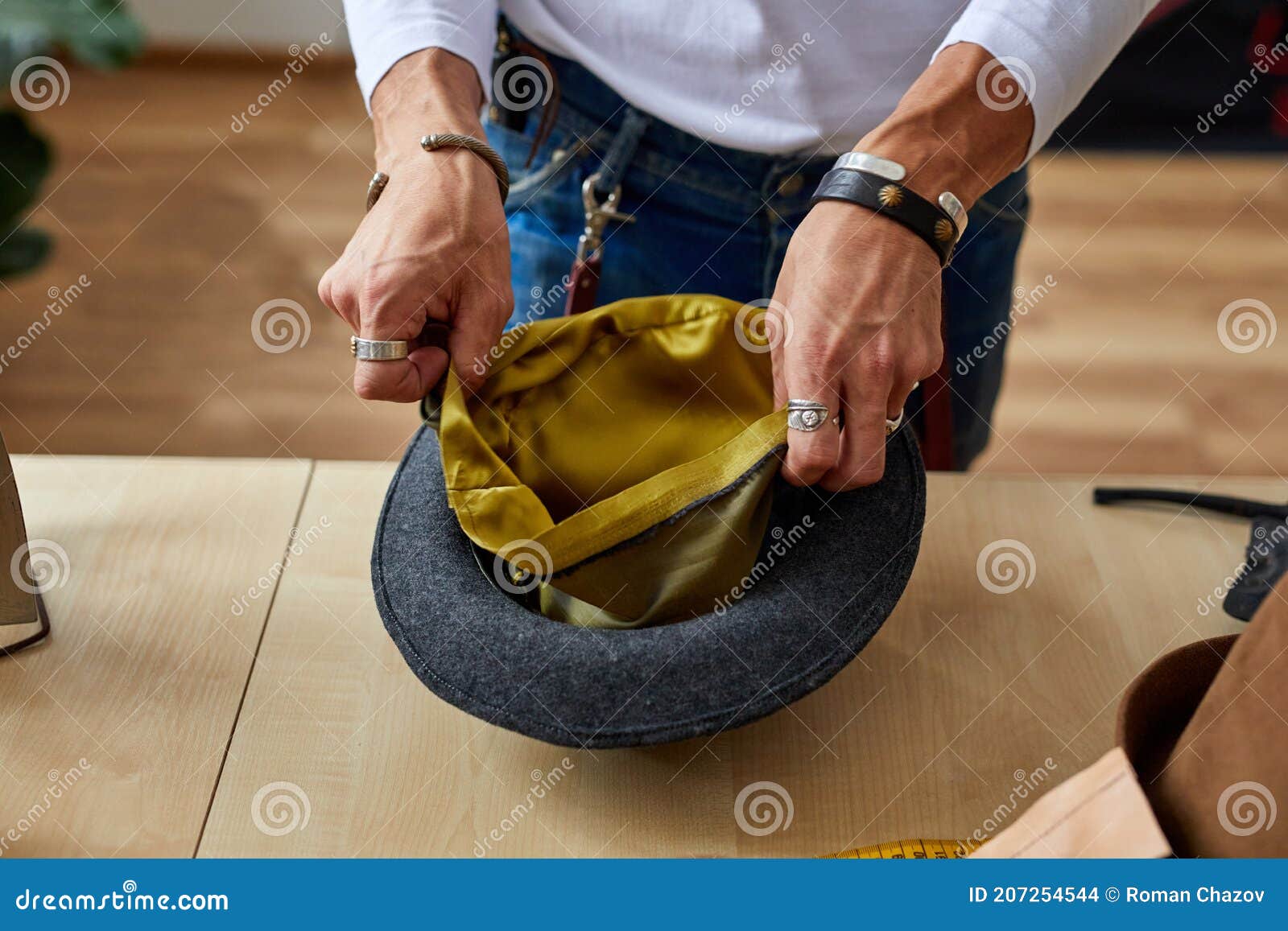 Cropped Tailor Man Creates Layer for the Inside of the Hat Stock Photo ...