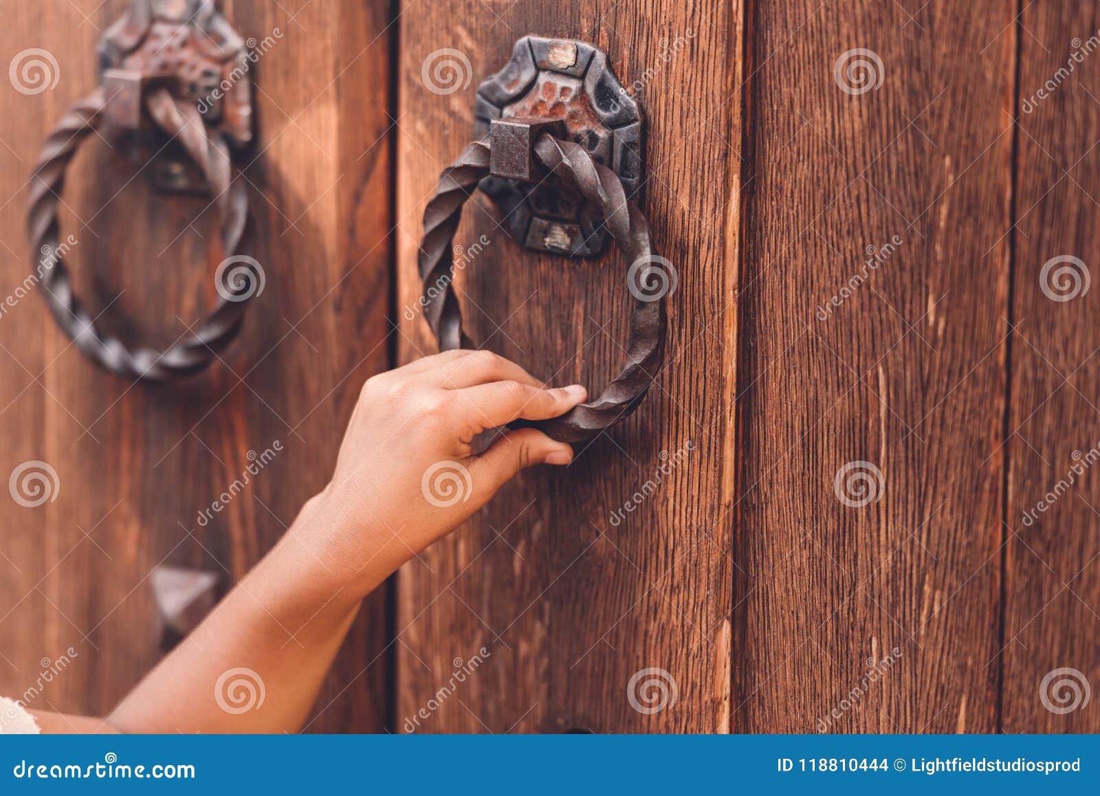 A Man Knocking On A Red Door With A Knocker Royalty-Free Stock Photo ...