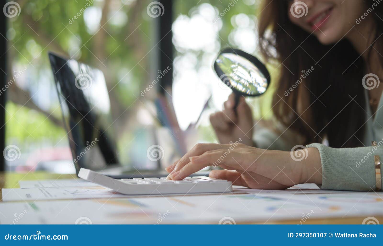 Cropped View of Female Auditor Reading Document through Magnifying ...