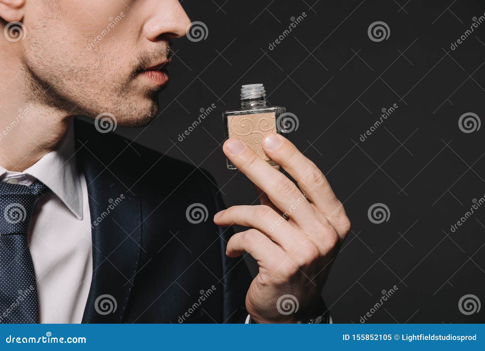 Cropped View of Man in Suit Smelling Perfume Isolated Stock Image ...