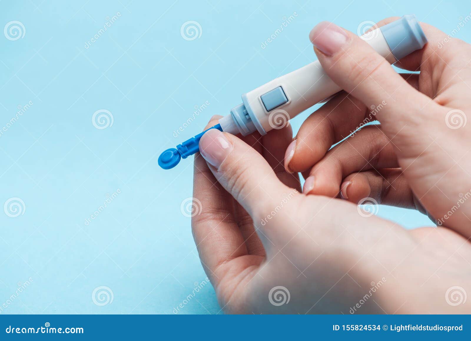Cropped View of Woman Testing Glucose Level with Disposable Needle ...