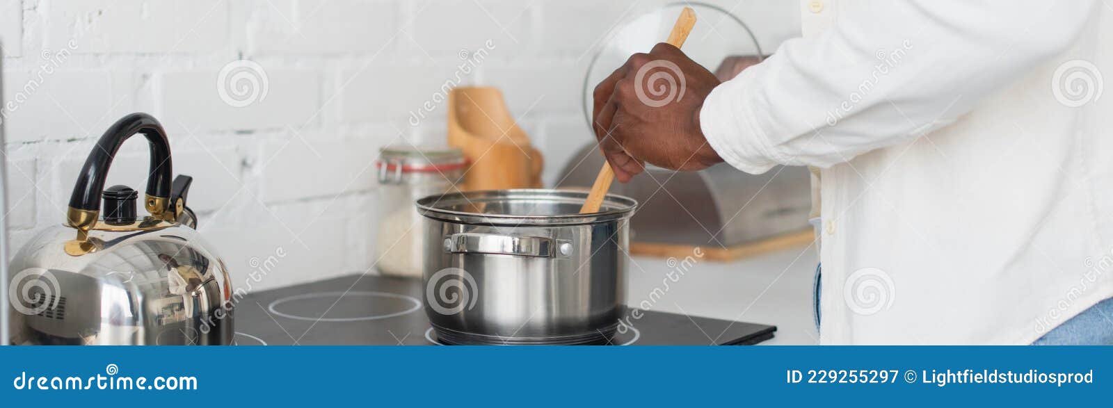 Cropped View of Young African American Stock Image - Image of kettle ... Cropped View of Young African American Stock Image - Image of kettle ...