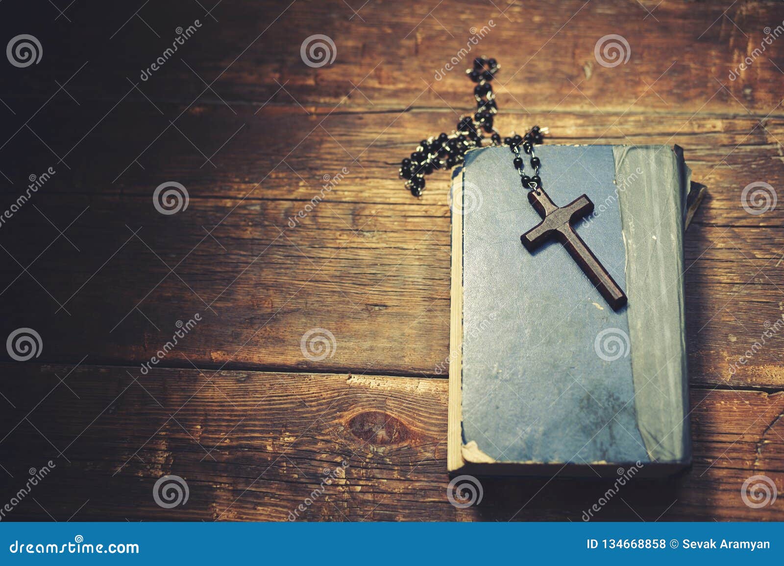Cross on book stock photo. Image of crucifix, crucifixion - 134668858