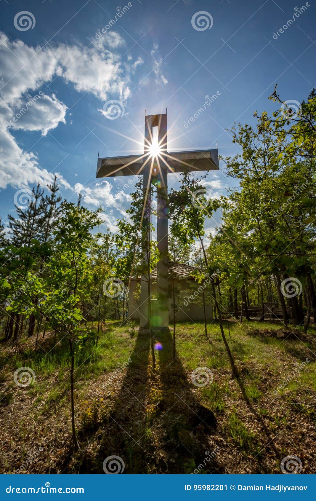 Cross with a Bright Blue Sky and Sun Stock Image - Image of symbol ...