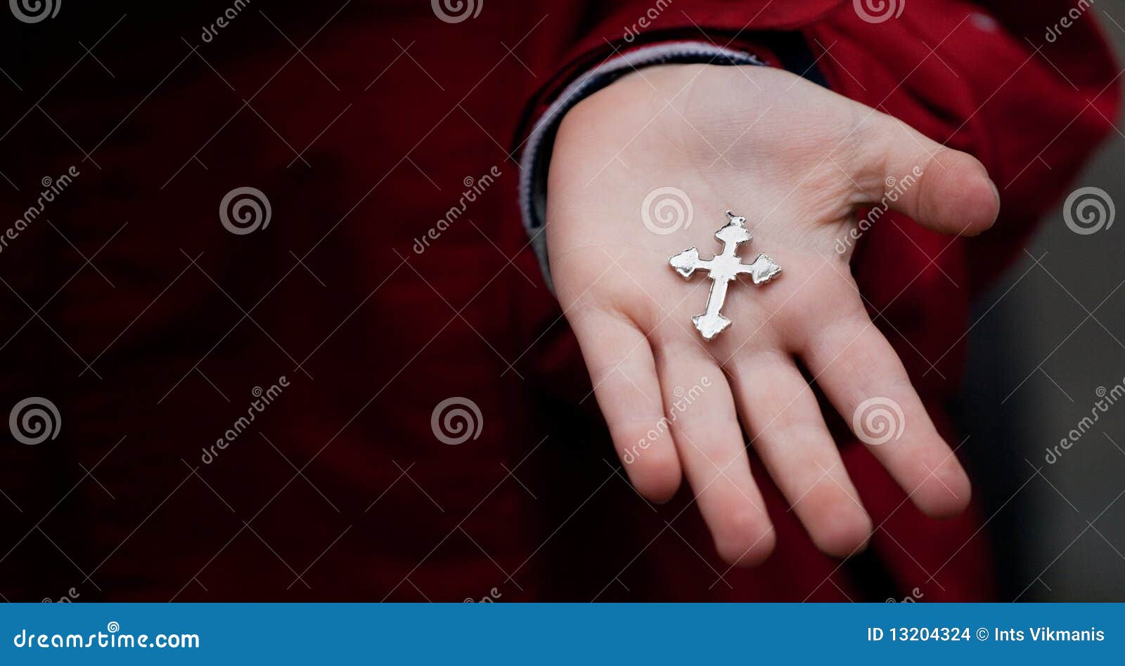 Cross in child hands stock photo. Image of praying, hand - 13204324