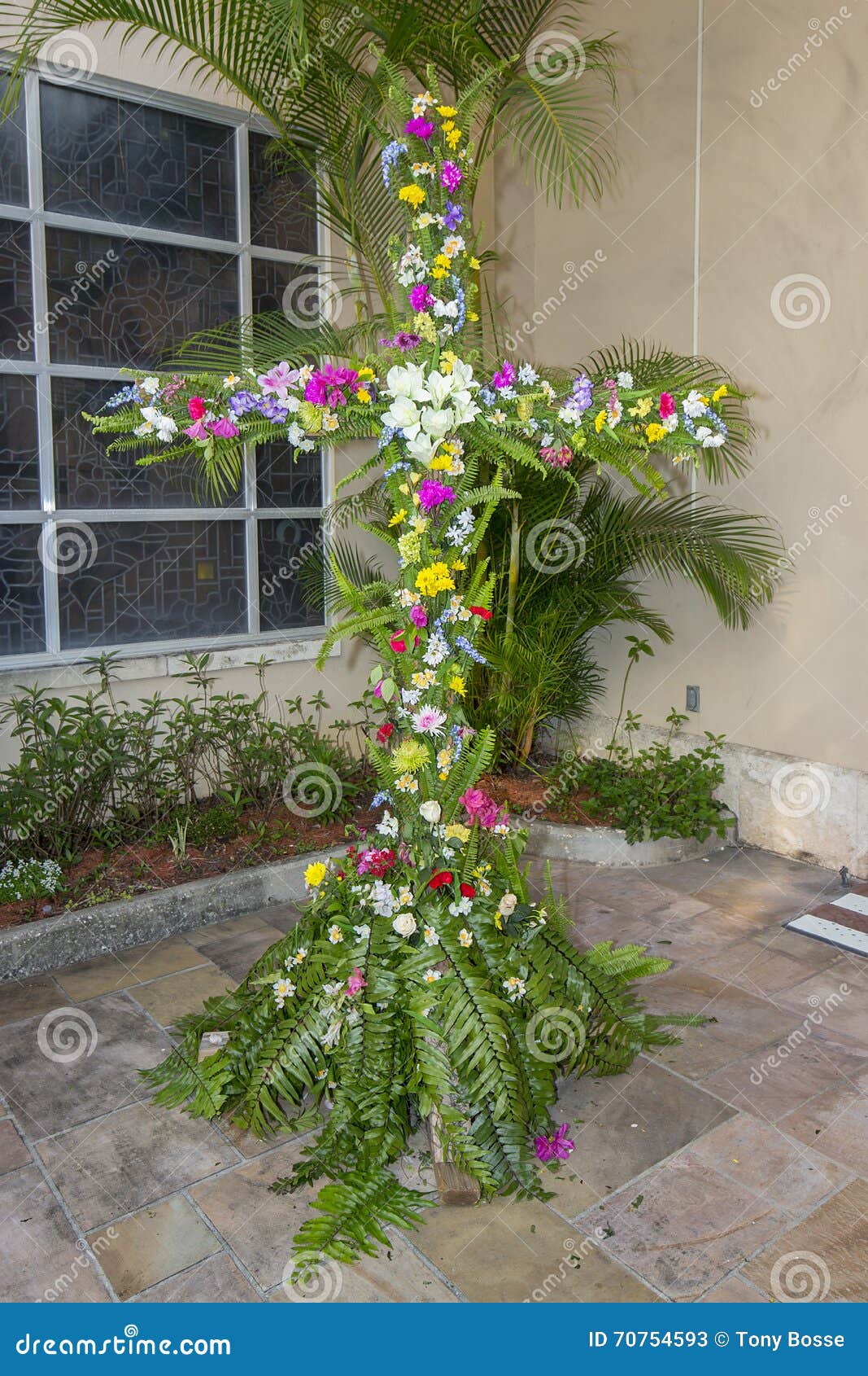 Cross Covered in Flowers stock image. Image of floral - 70754593