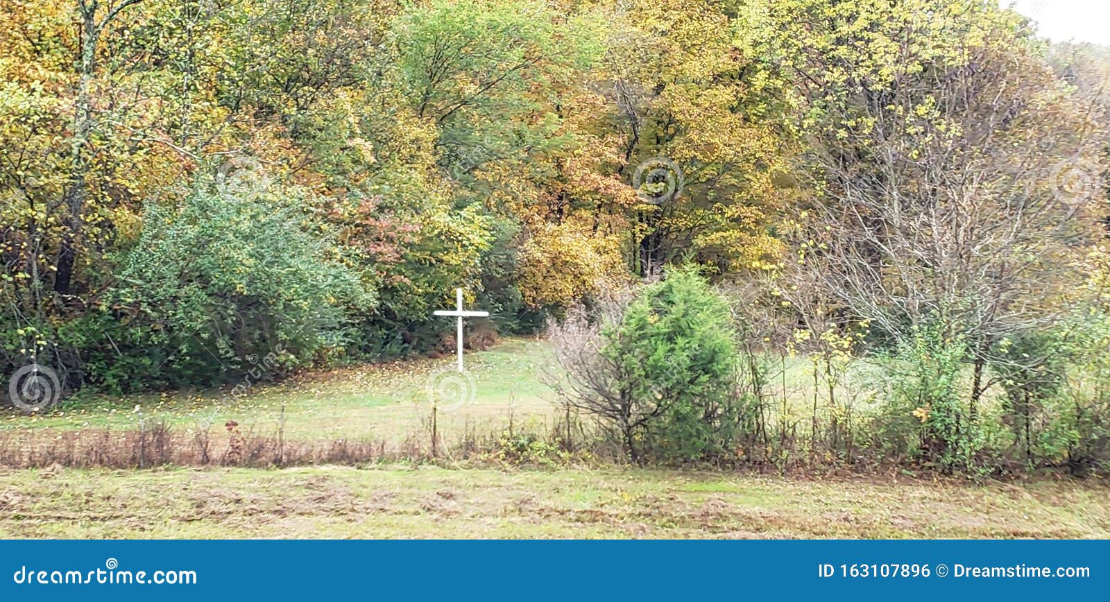 Cross in fall trees stock photo. Image of colorful, trees - 163107896