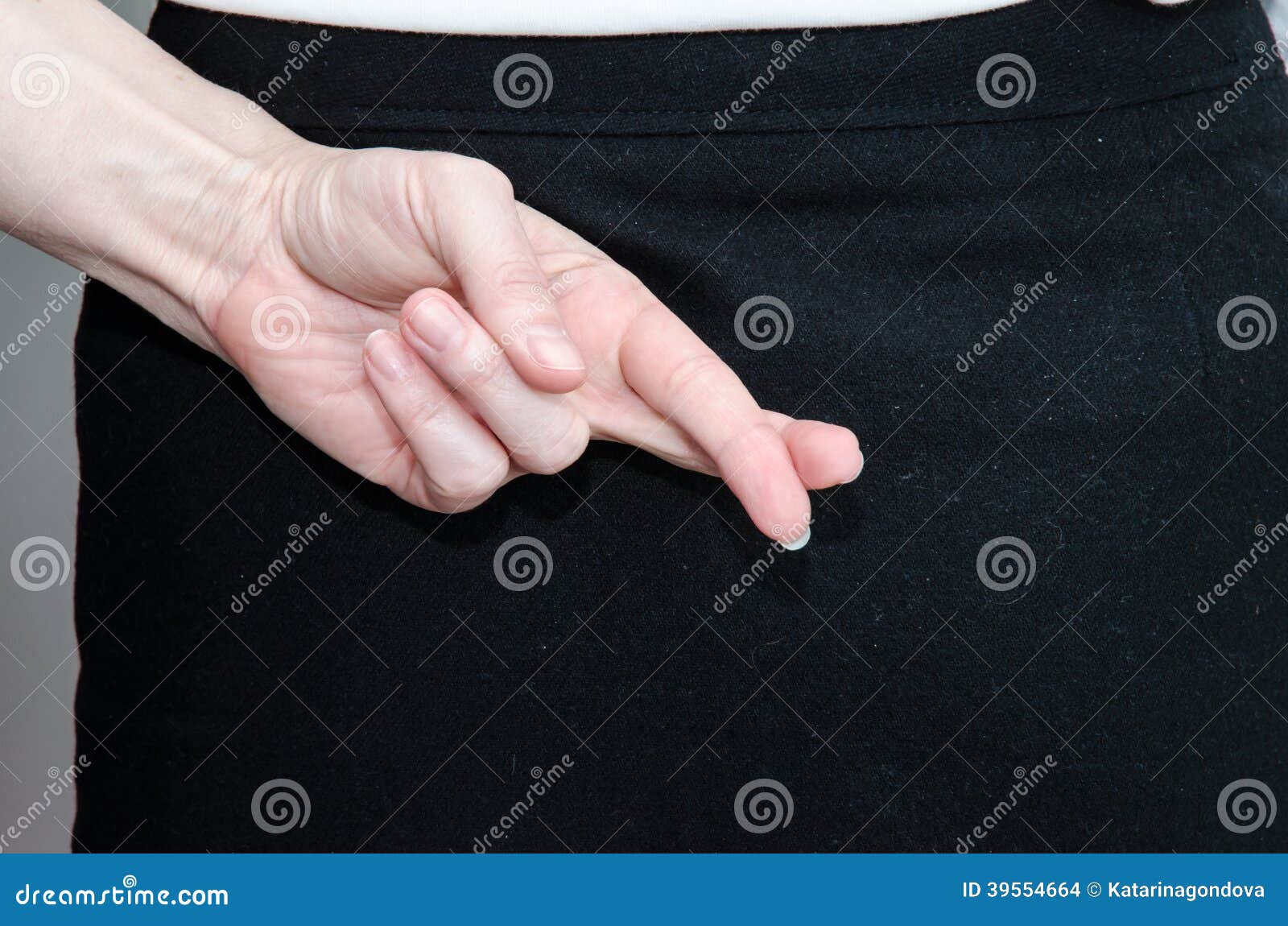 Cross Fingers Of Woman`s Hand With Rim Light Isolated On White ...