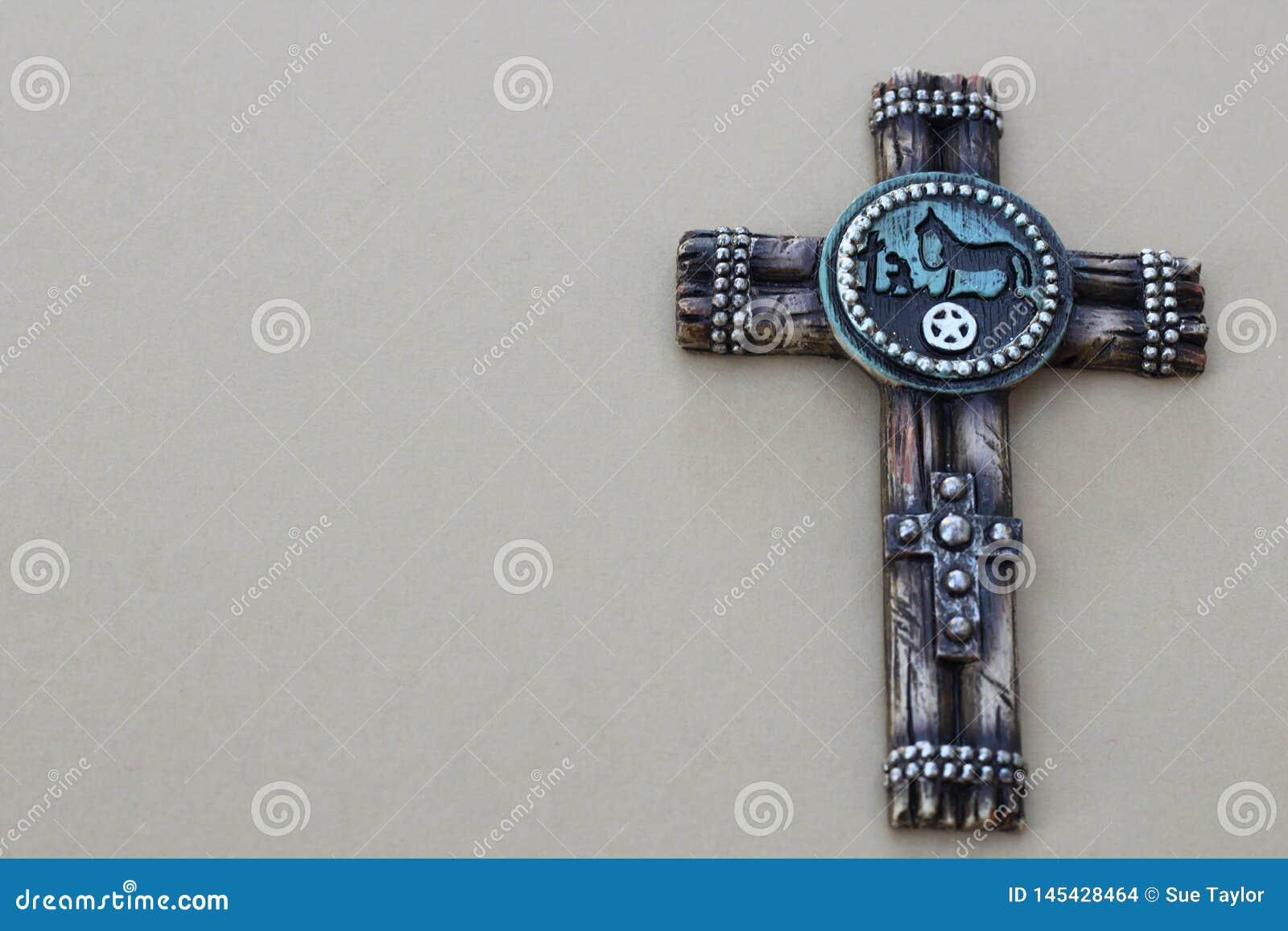 Cross on a grey background stock photo. Image of cross - 145428464