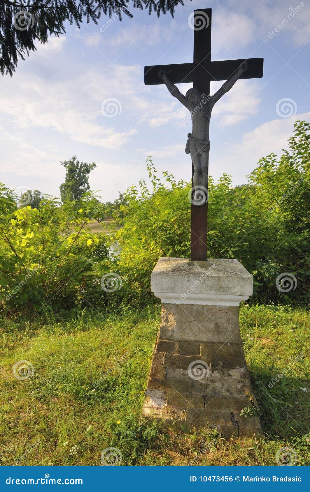 Cross by the lake stock photo. Image of prayer, countryside - 10473456