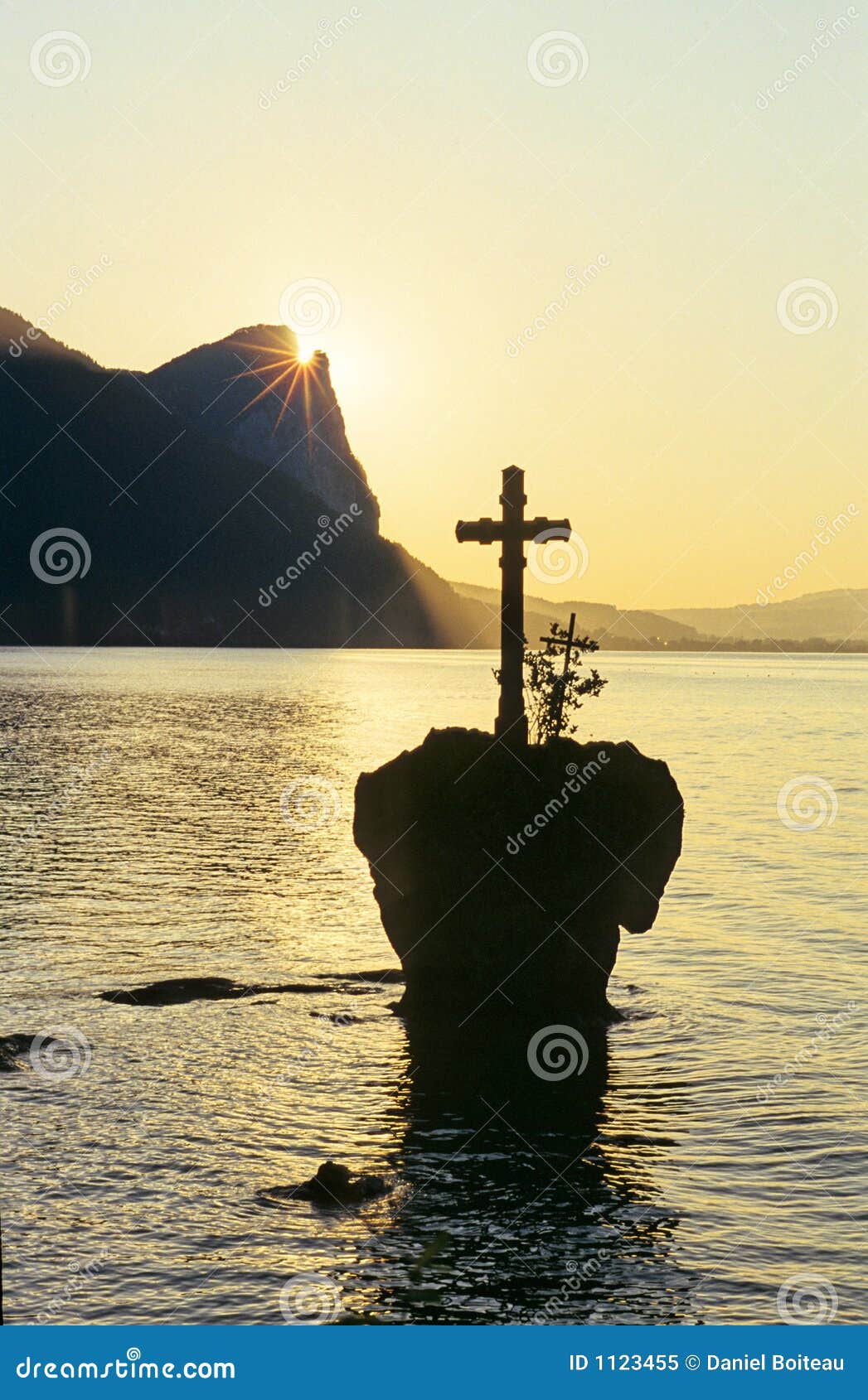 Cross on lake stock image. Image of quiet, wave, golden - 1123455