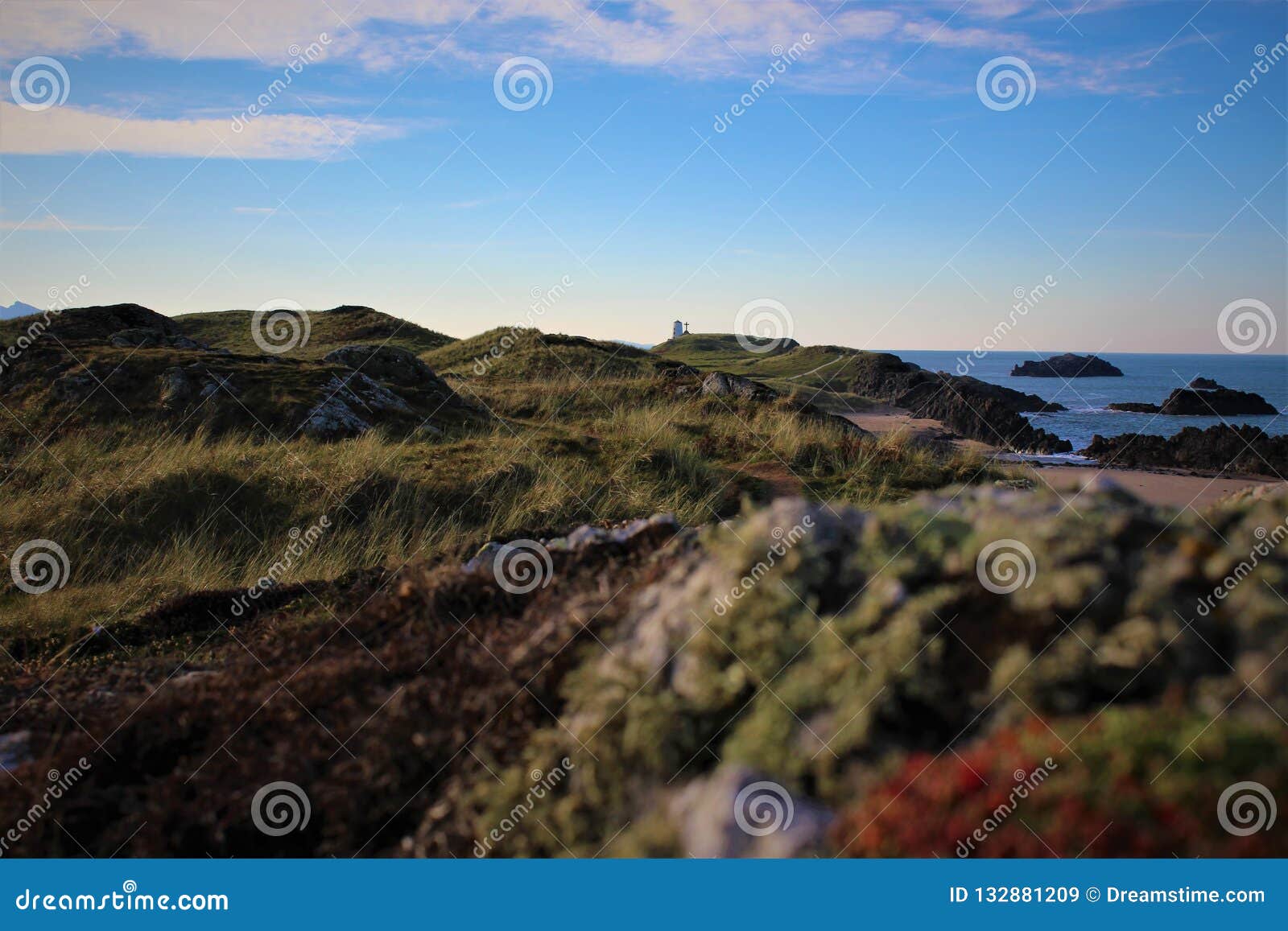 The Cross and the Lighthouse in the Background Stock Image - Image of ...
