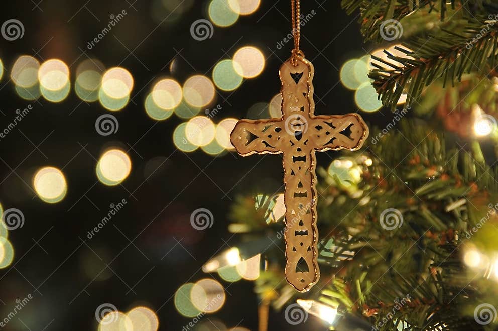 Cross Ornament on Christmas Tree Stock Image - Image of christ, night ...