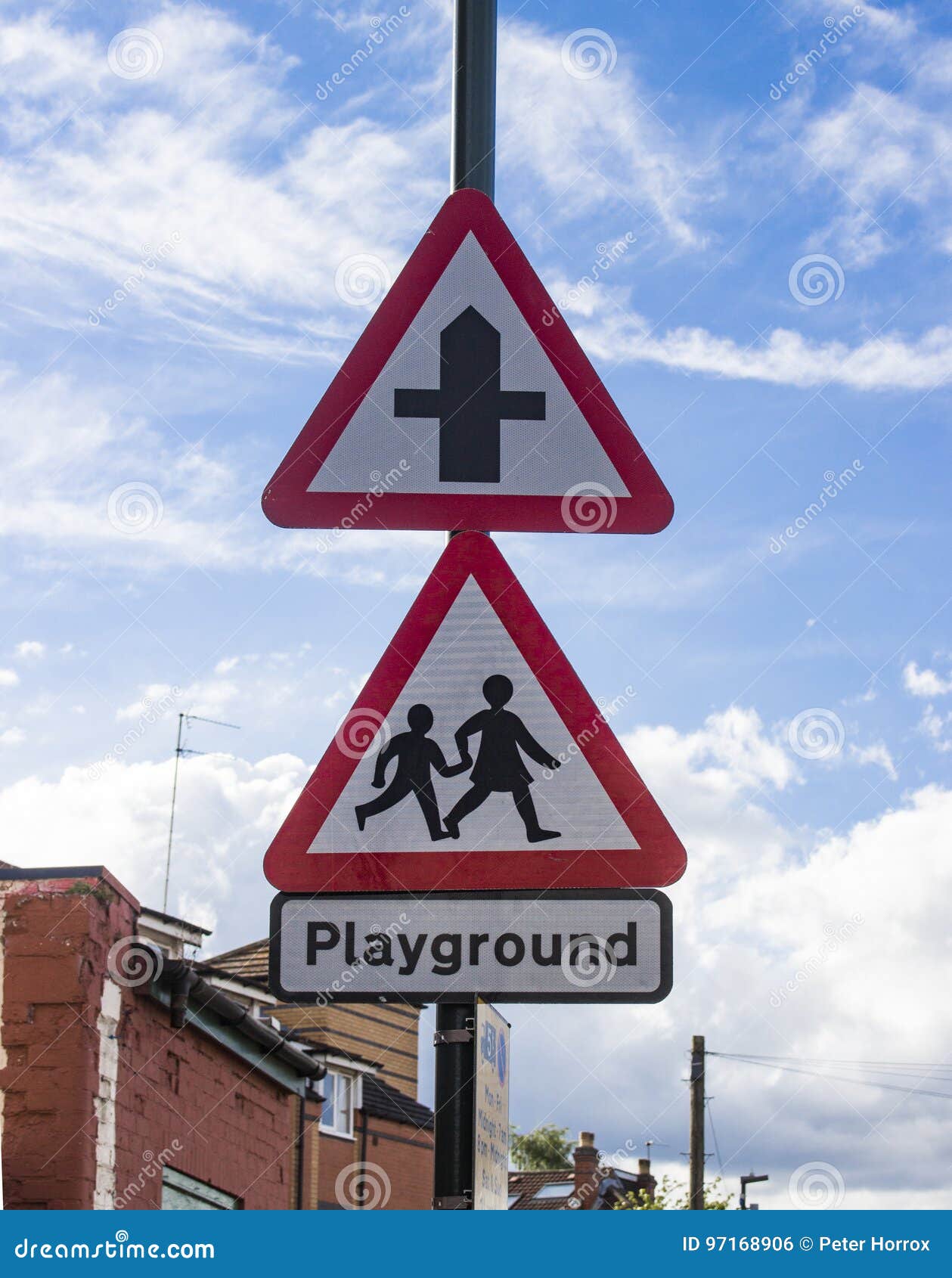 Cross Roads and Playground Warning Stock Photo - Image of playground ...