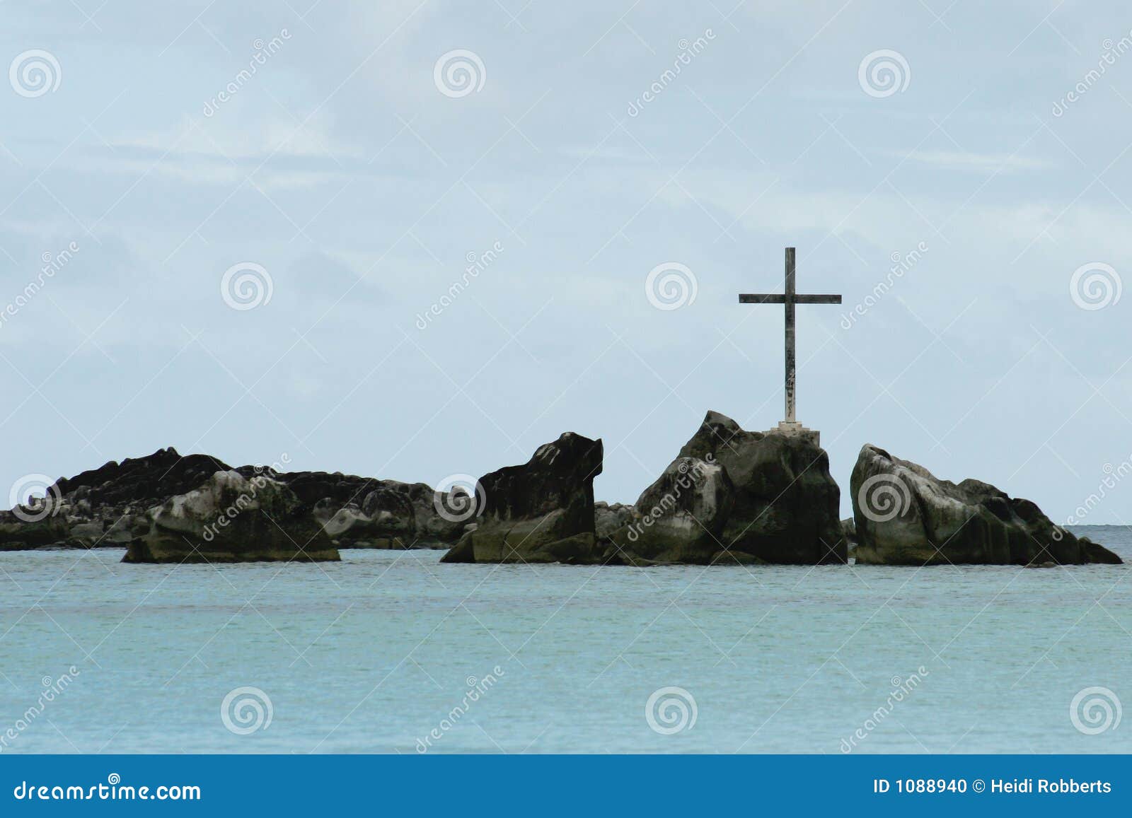 Cross on the rocks stock photo. Image of spiritual, cristian - 1088940