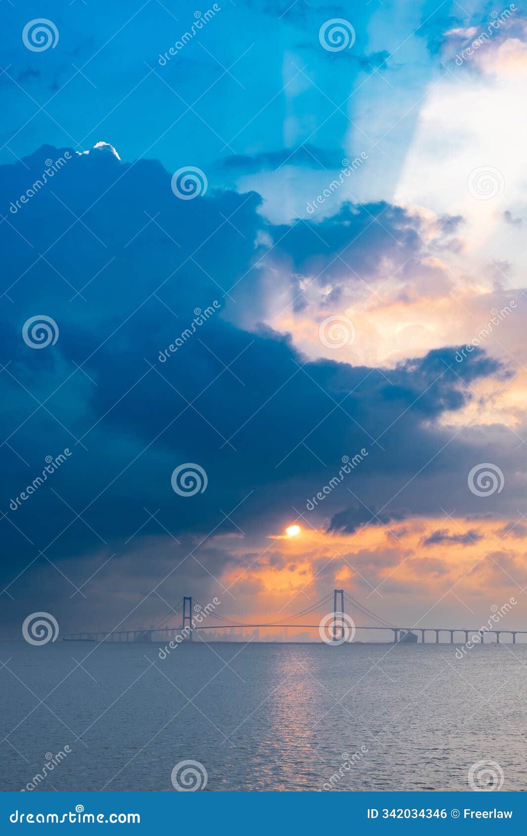 Cross-sea Bridge at Sunrise with Beautiful Clouds at Vertical ...
