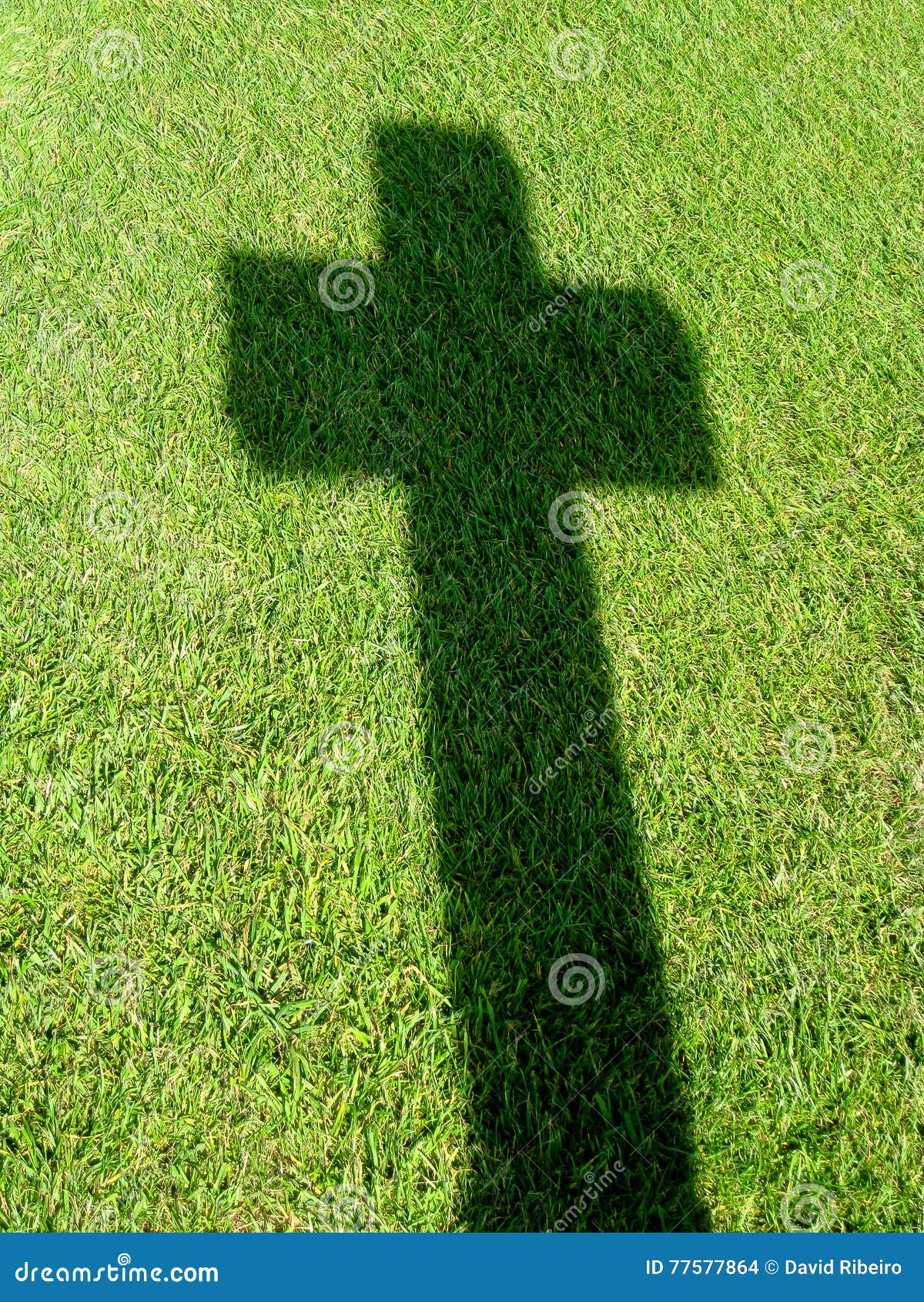 Cross shadow on grass stock photo. Image of statue, gravestone - 77577864