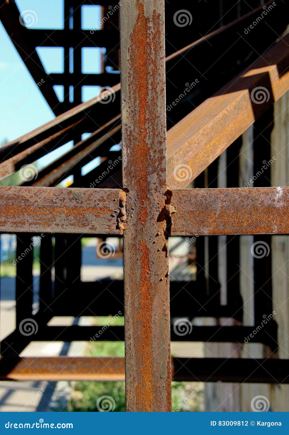 A Cross Shaped Metal Construct Made of Rusty Angle Sections Connected ...