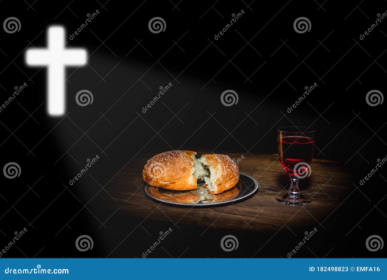 Cross Shining on Holy Communion Bread and Wine on Black Stock Image ...