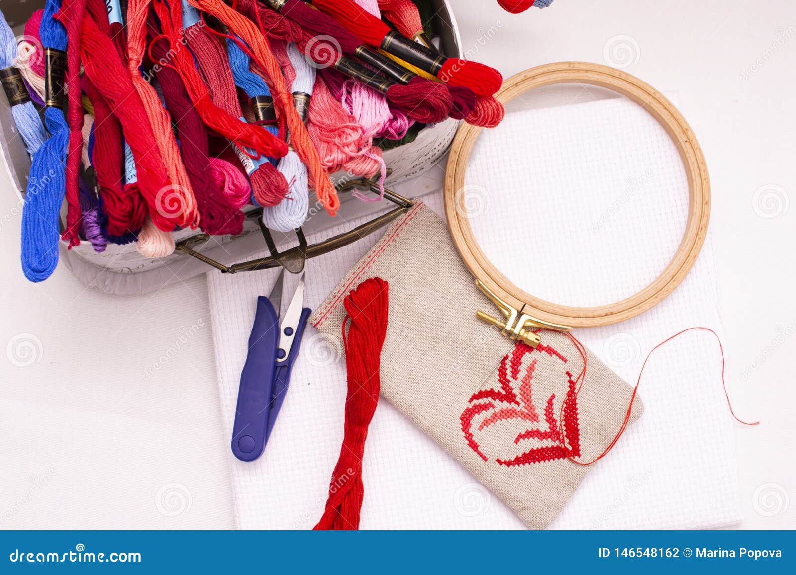 Cross stitch, red color stock photo. Image of accessories - 146548162