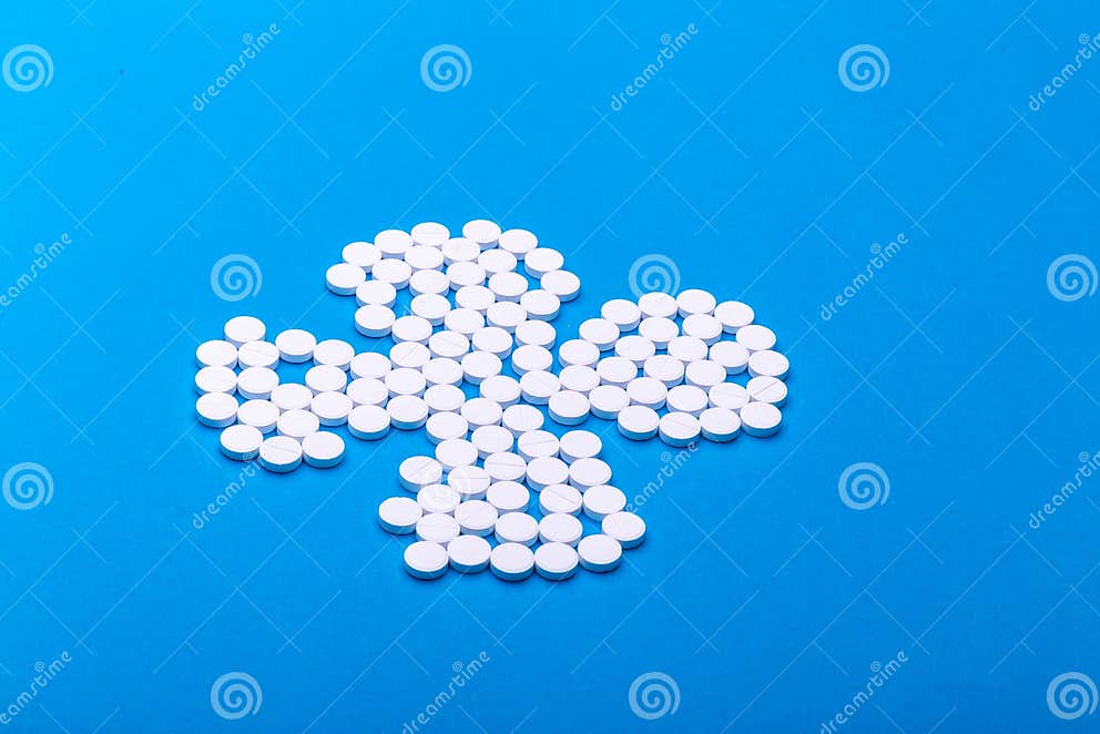 Cross of Tablets on a Blue Background Stock Image - Image of science ...