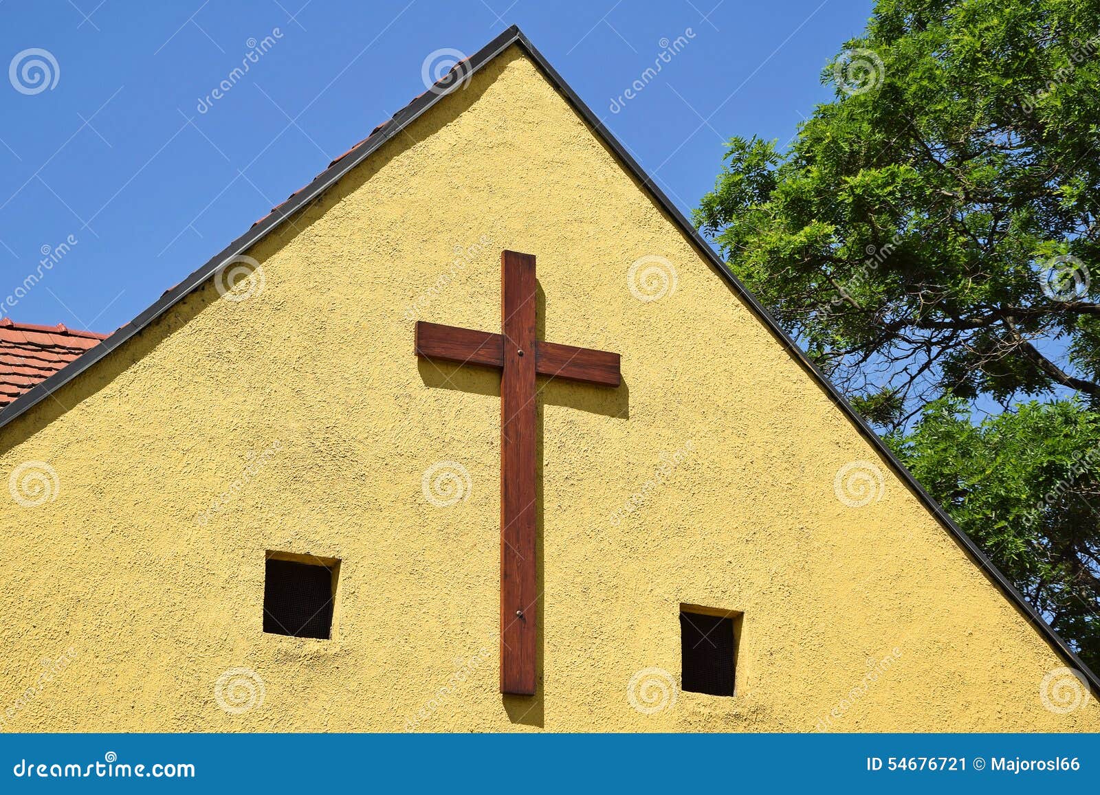 Cross on the wall stock image. Image of angle, front - 54676721