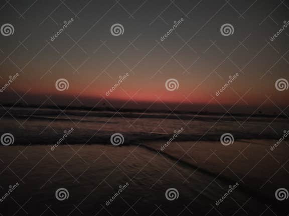 Cross waves on shore stock photo. Image of wave, evening - 267610424