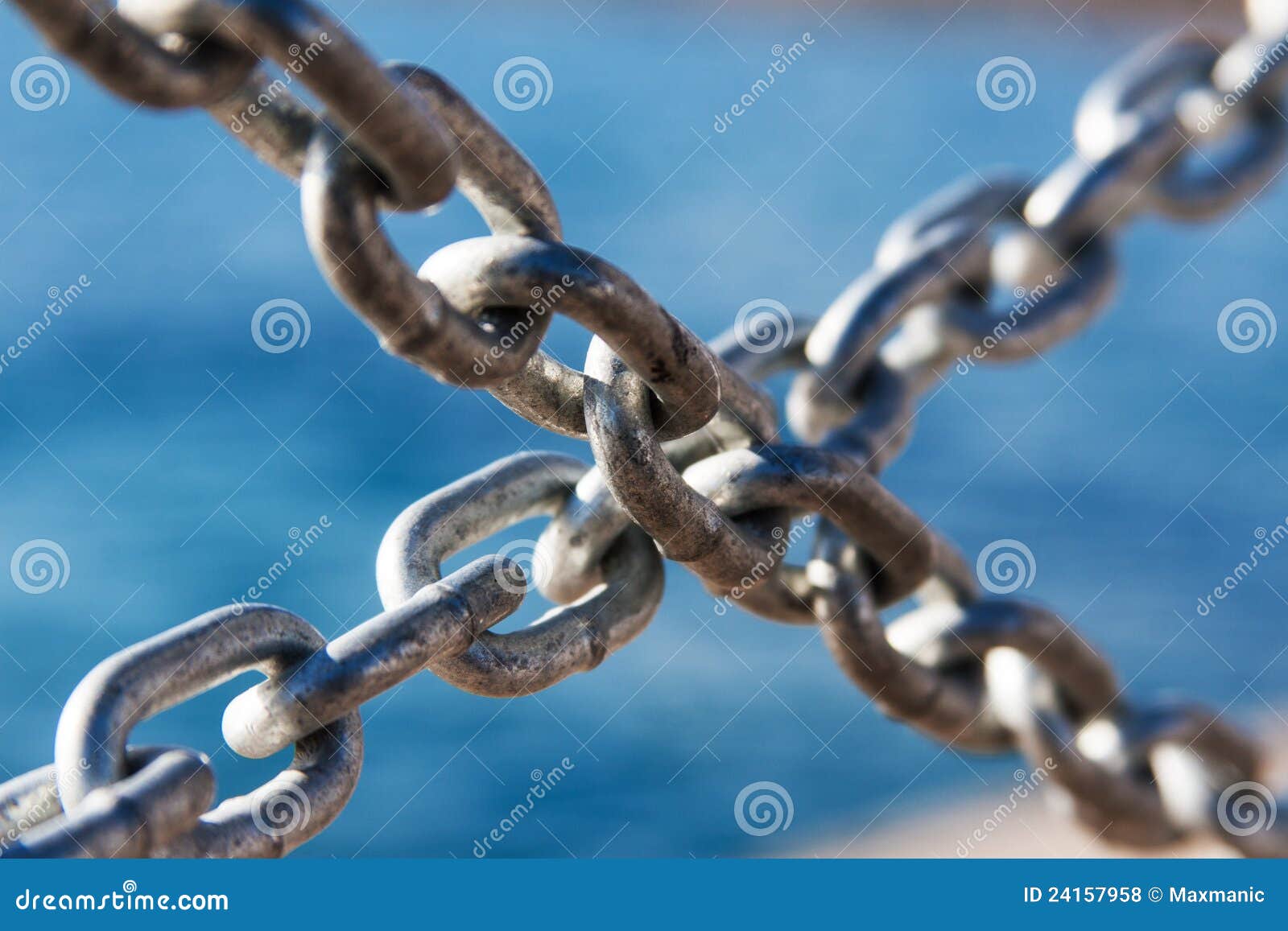 Crossed chains stock photo. Image of blue, cross, lake - 24157958