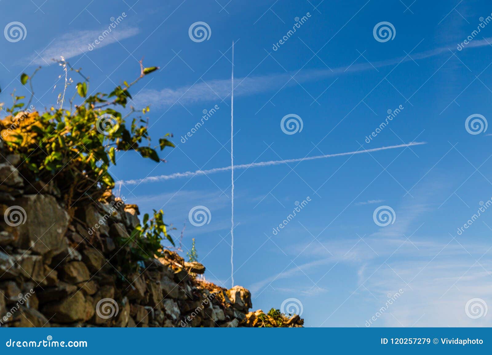Crossed plane trails stock image. Image of stones, crossed - 120257279