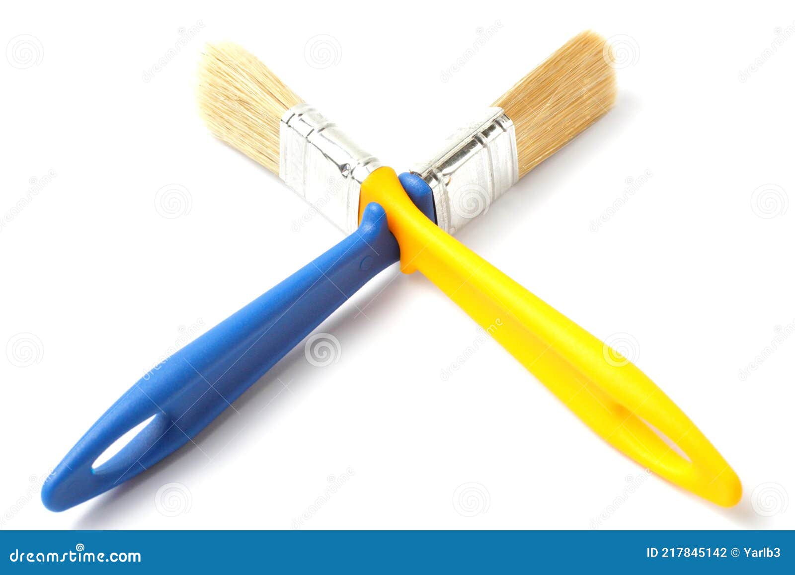 Crossed Two Paint Brushes Close-up on a White Background Stock Photo ...
