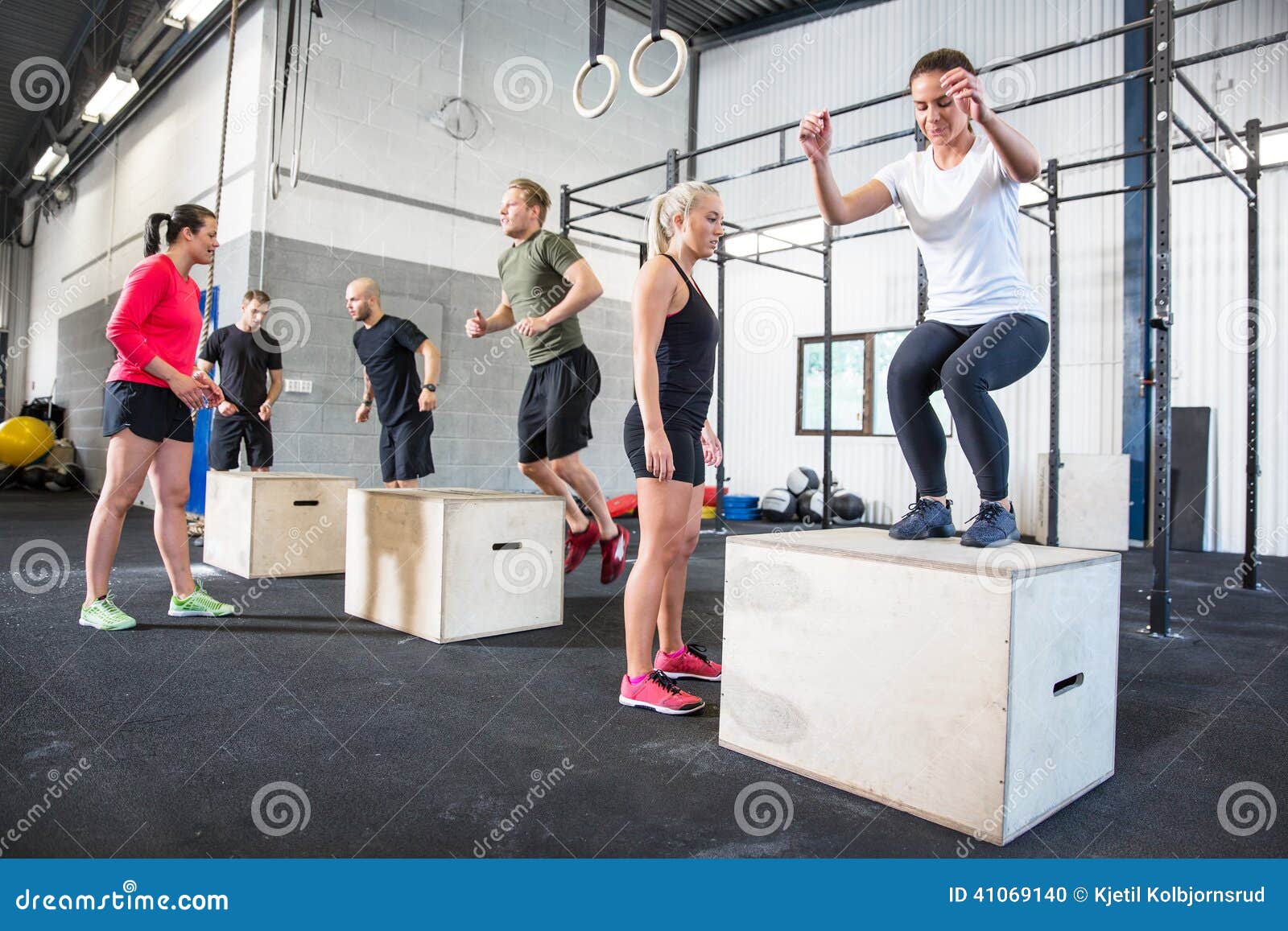 Crossfit Group Trains Box Jumps Stock Photo - Image of competition ...