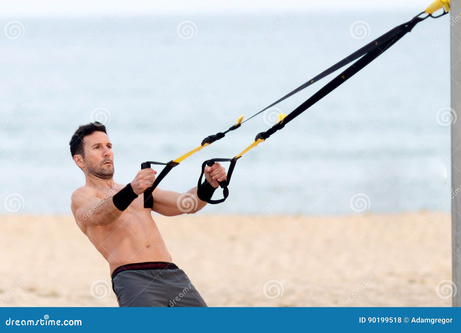 Crossfit Training on the Beach Stock Photo - Image of athletic, oblique ...